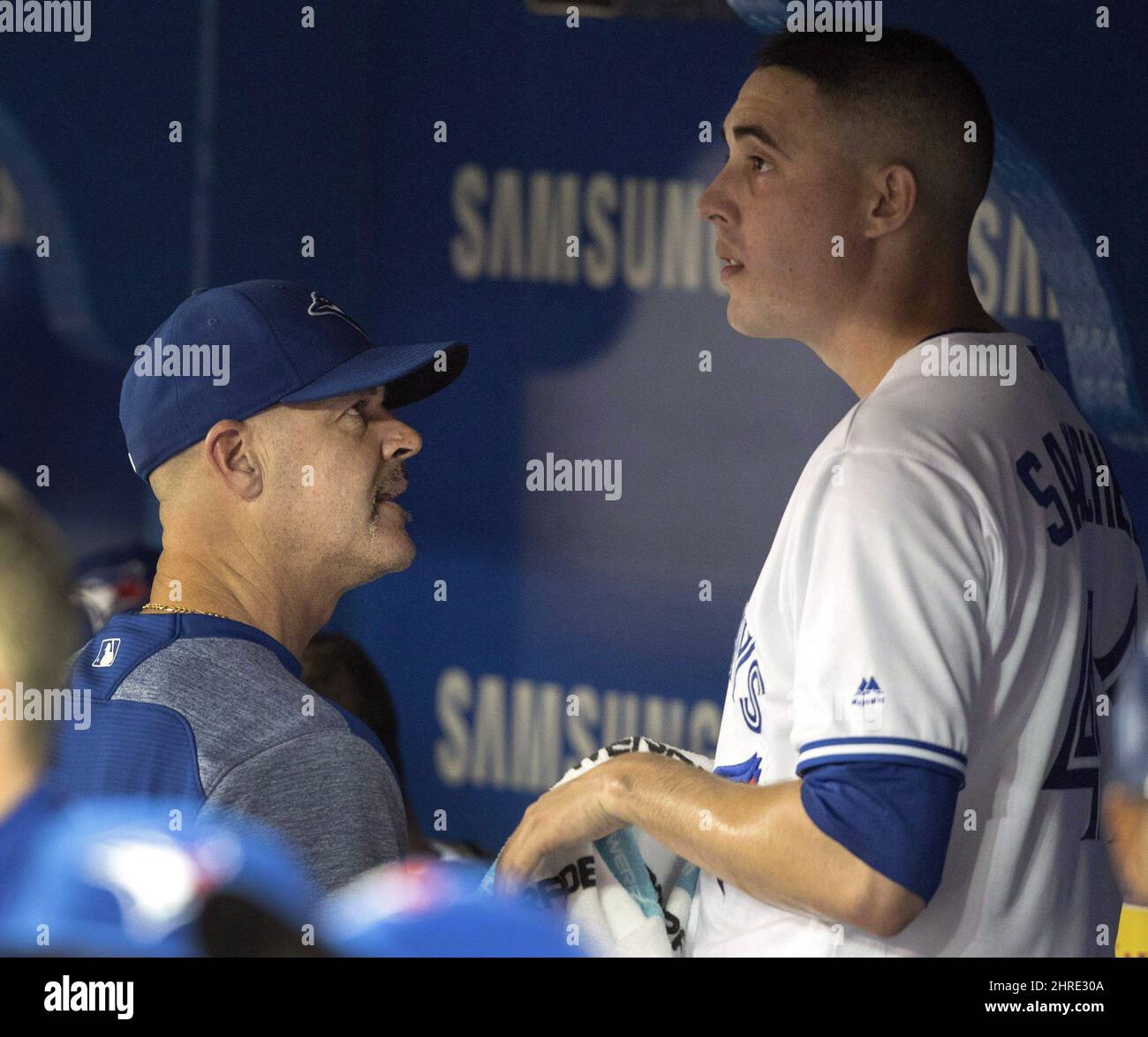 Toronto Blue Jays pitching coach Pete Walker talks to starting pitcher ...