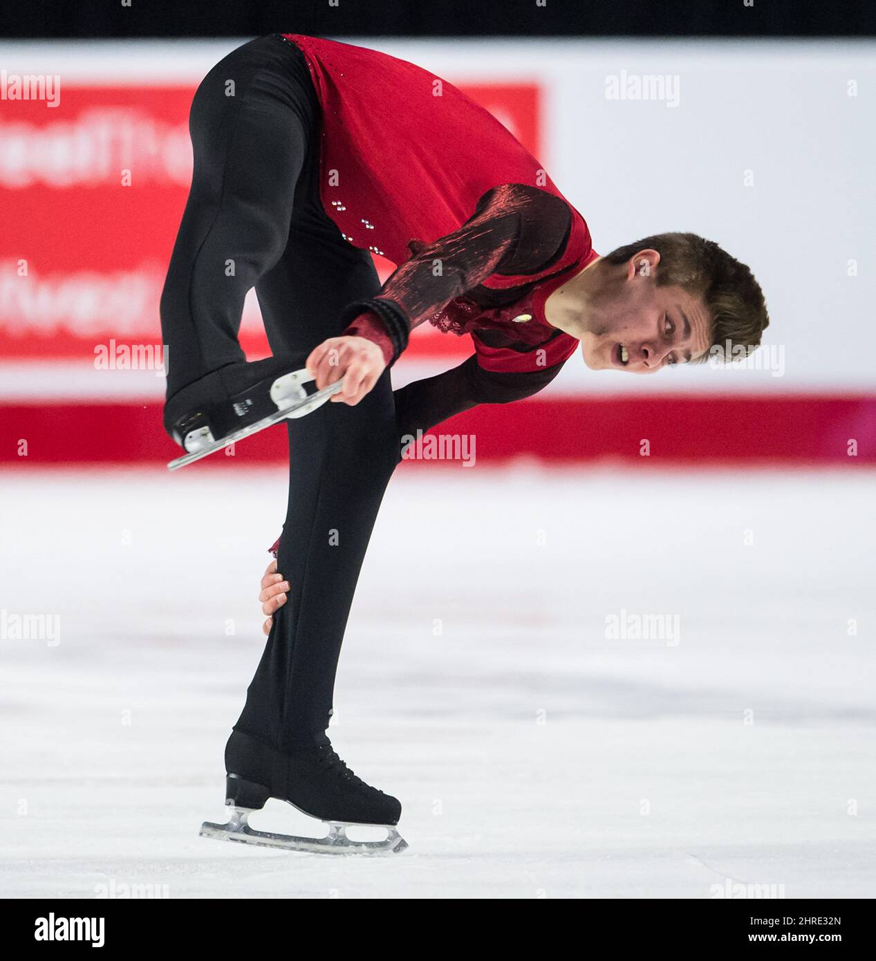 Roman Sadovsky, of Toronto, Ont., performs his short program during the ...