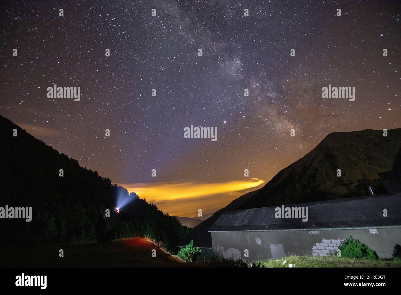Milky way and stars at night in a mountain in Pyrenees in Catalonia ...