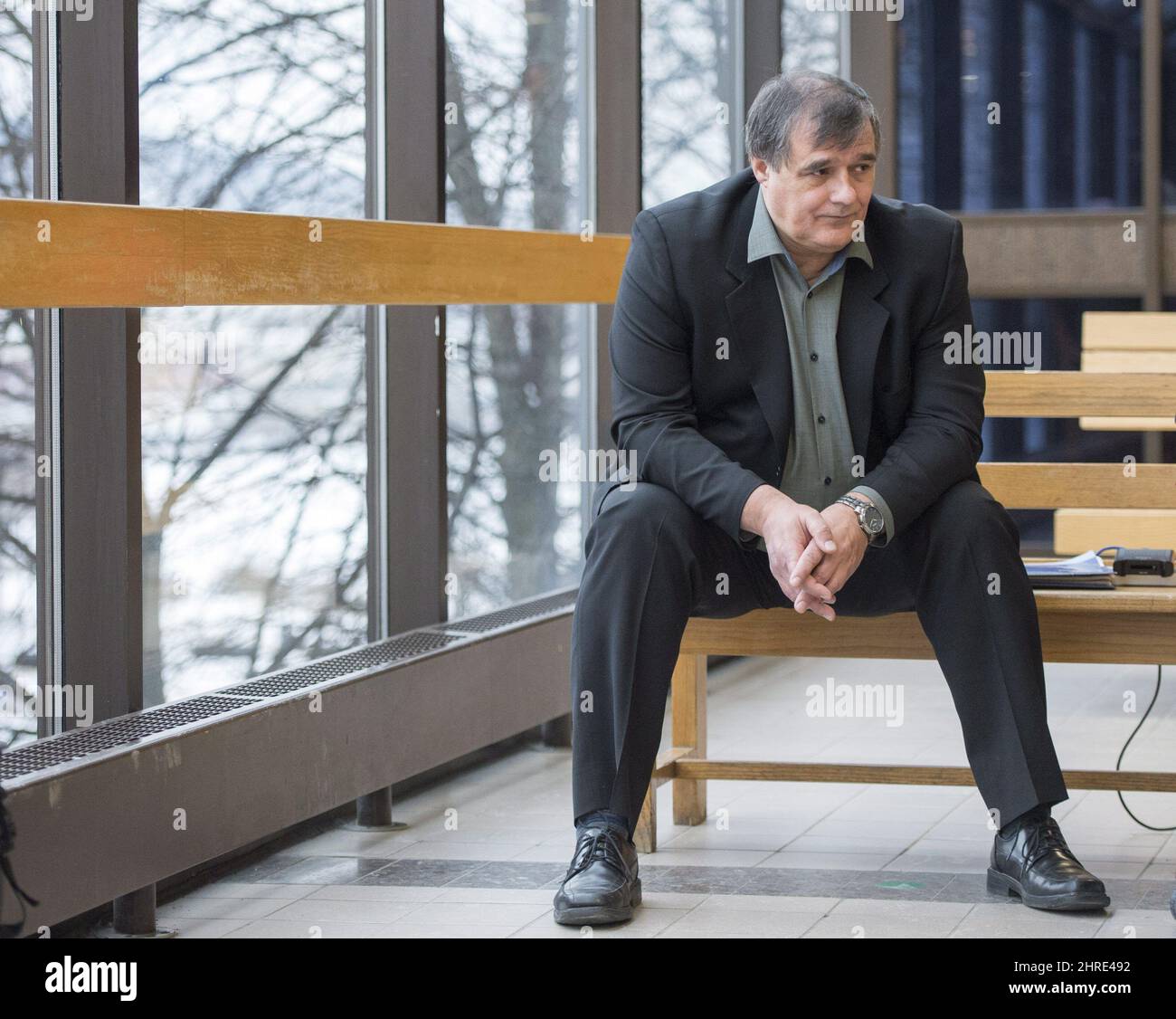Rail traffic controller Richard Labrie waits at the courthouse as the ...