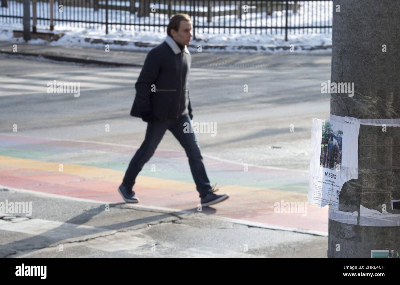 A worn missing poster for Andrew Kinsman is taped to a pole in the Church and Wellesley ...