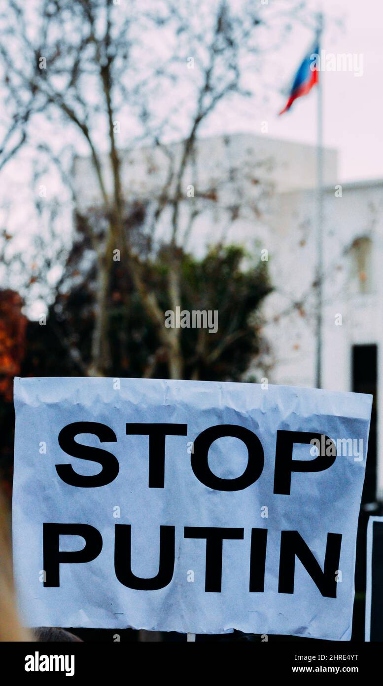 Stop Putin sign with Russian flag in the background - anti-war message ...