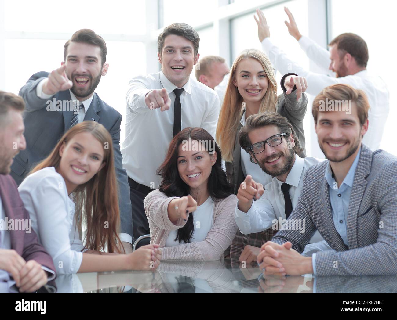 group of young employees are pointing at you Stock Photo - Alamy