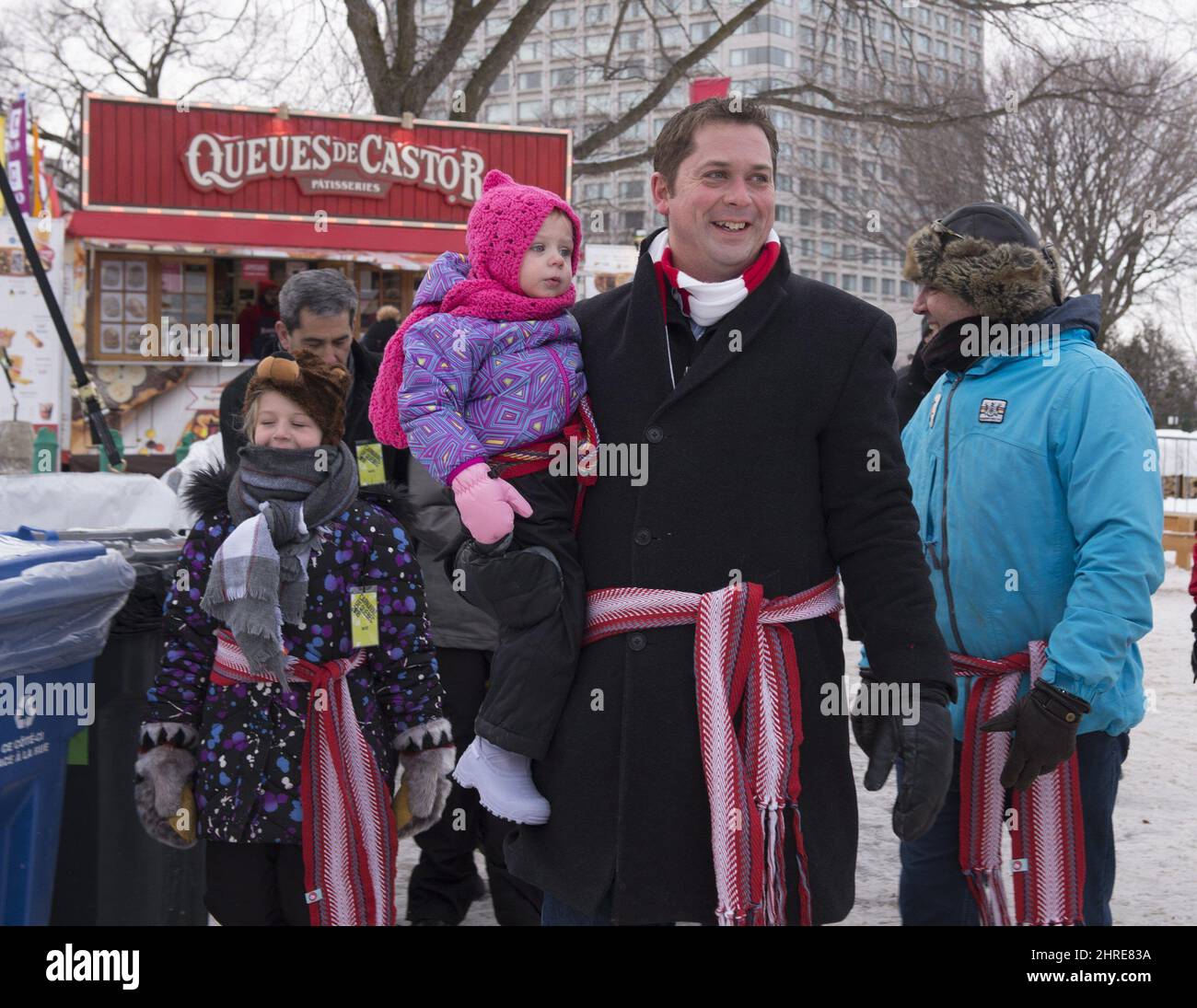 Conservative Leader Andrew Scheer holds his daughter Mary as his other ...