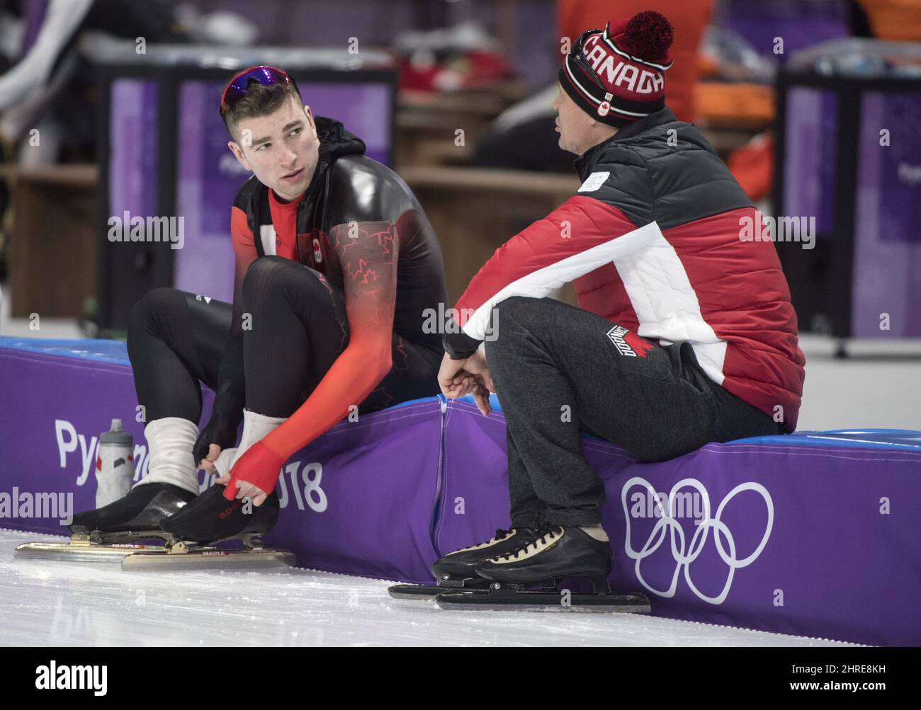 Alexandre St-Jean listens to his coach Bart Schouten during a practice ...