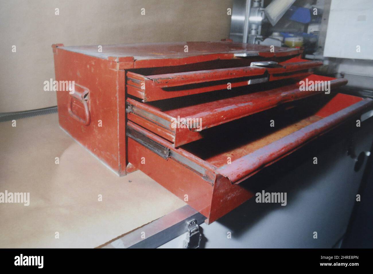 Copy photo of the evidence photo of a recovered toolbox used in the ...