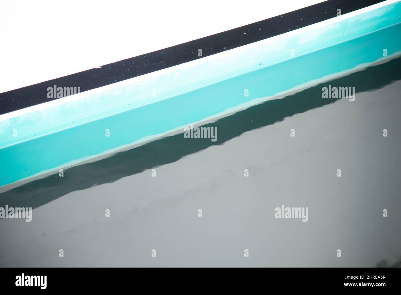 Painted boat gunwale in teal abstract hi-res stock photography and ...