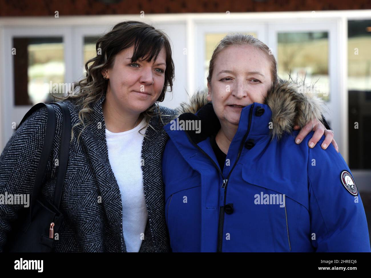 Judi Coyle (right) poses with her older daughter Melanie Smith outside ...