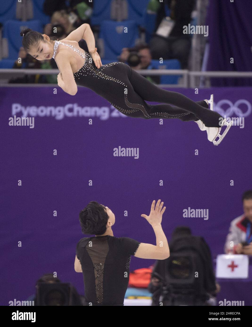 Ryom Tae Ok and Kim Ju Sik of North Korea compete in the pairs figure ...