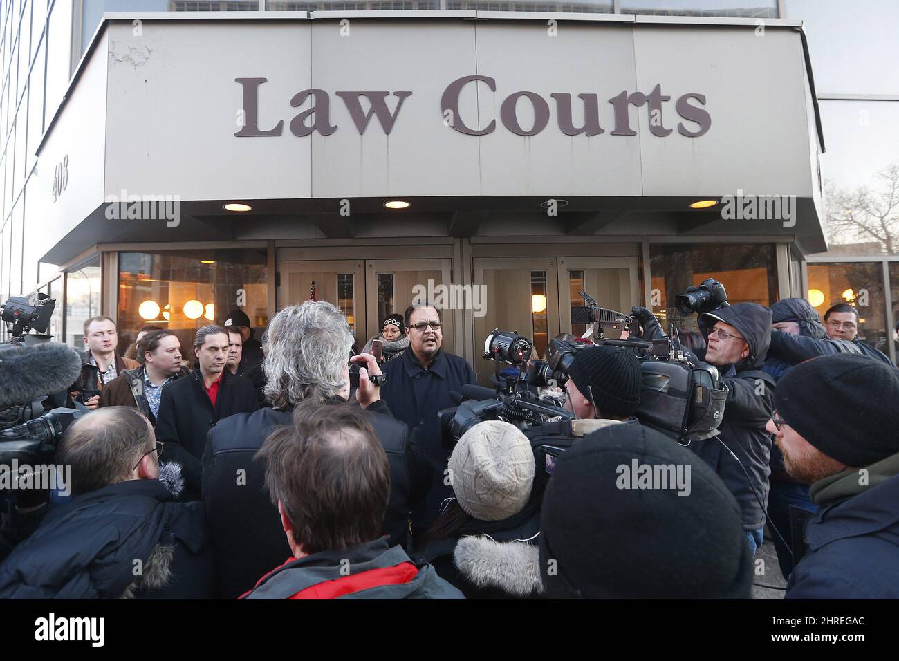 Chief Kevin Hart, centre, speaks to media outside the law courts in ...