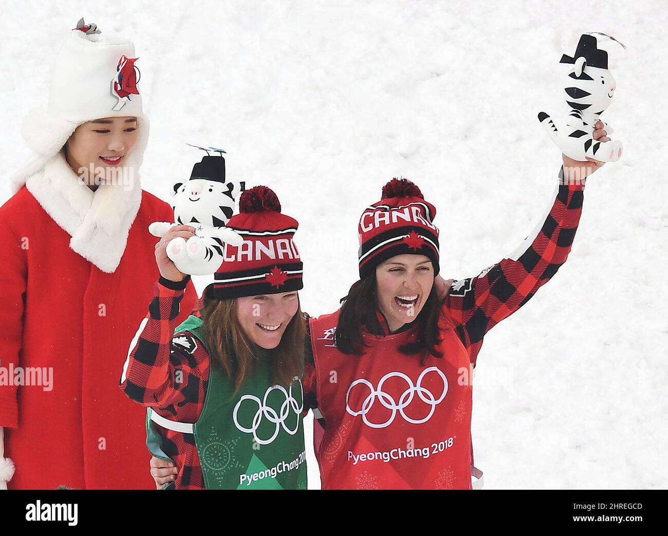 Gold medalist Kelsey Serwa, right, and silver medalist Brittany Phelan ...