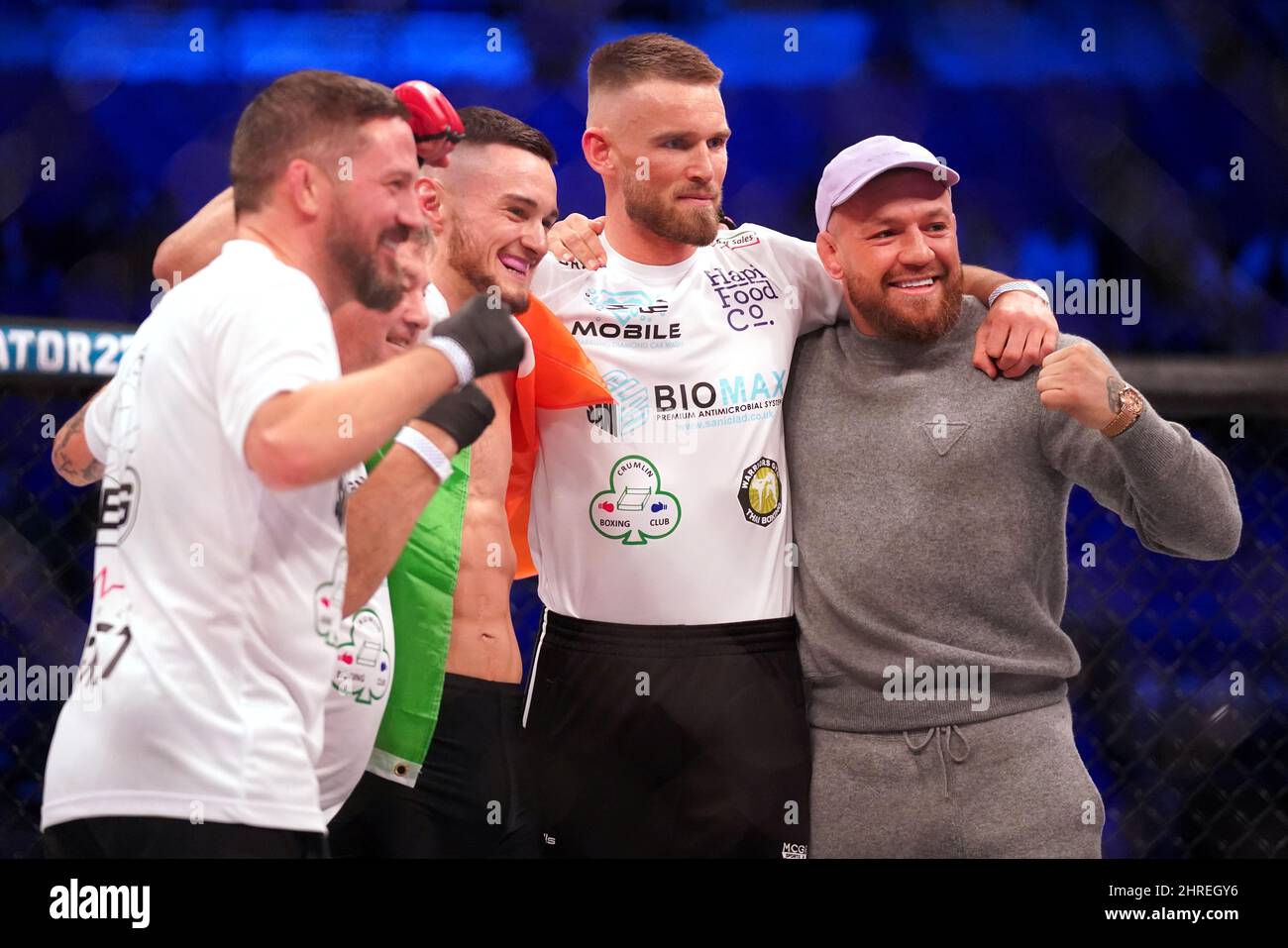 UFC fighter Conor McGregor (right) poses for a photo with SBG team mate ...