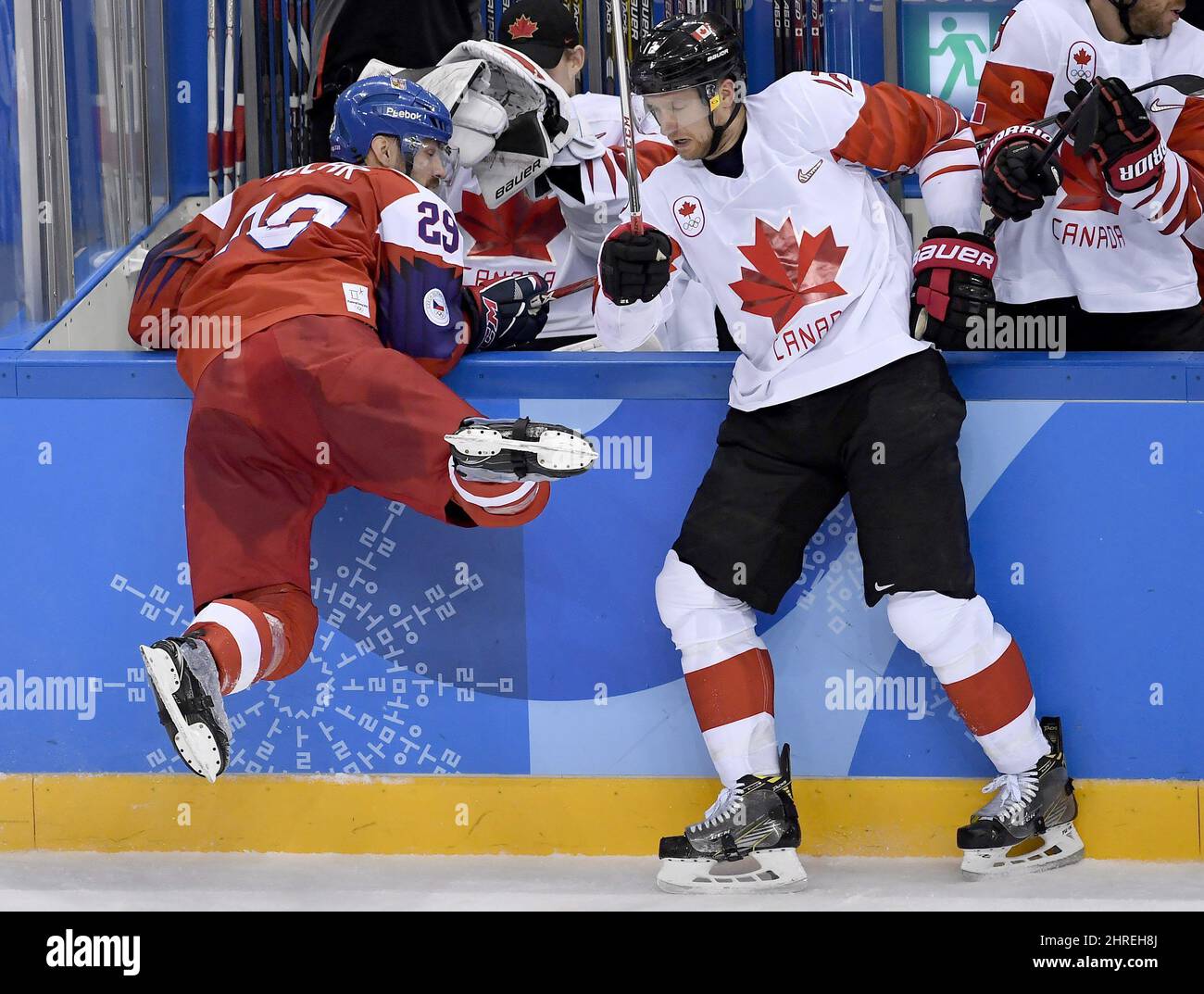 Czech Republic defenceman Jan Kolar (29) gets checked to the boards by ...