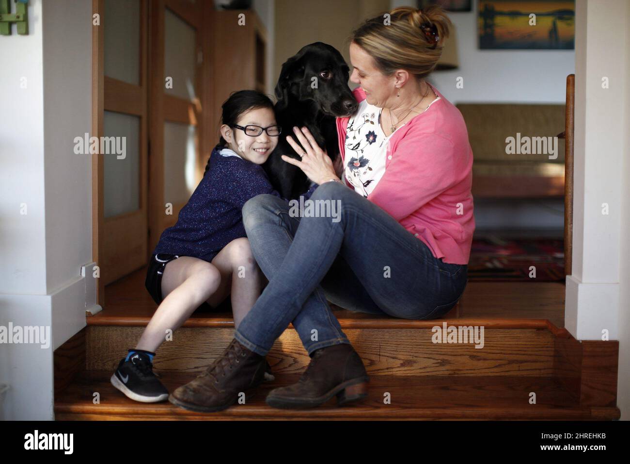 Isabelle Smit, 10, is photographed with her mother Kristen Lundgren and ...