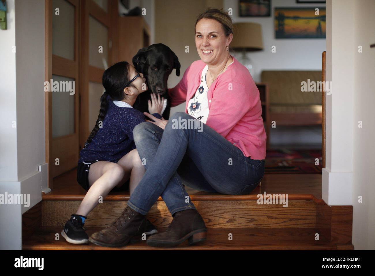 Isabelle Smit, 10, is photographed with her mother Kristen Lundgren and ...