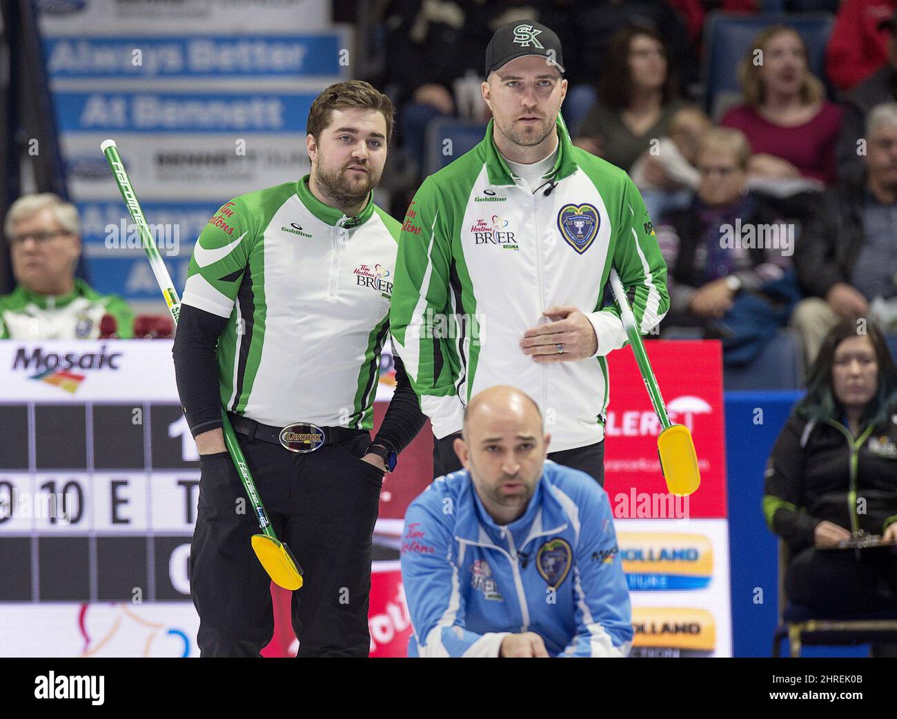 Saskatchewan skip Steve Laycock, right, and third Matt Dunston stand ...