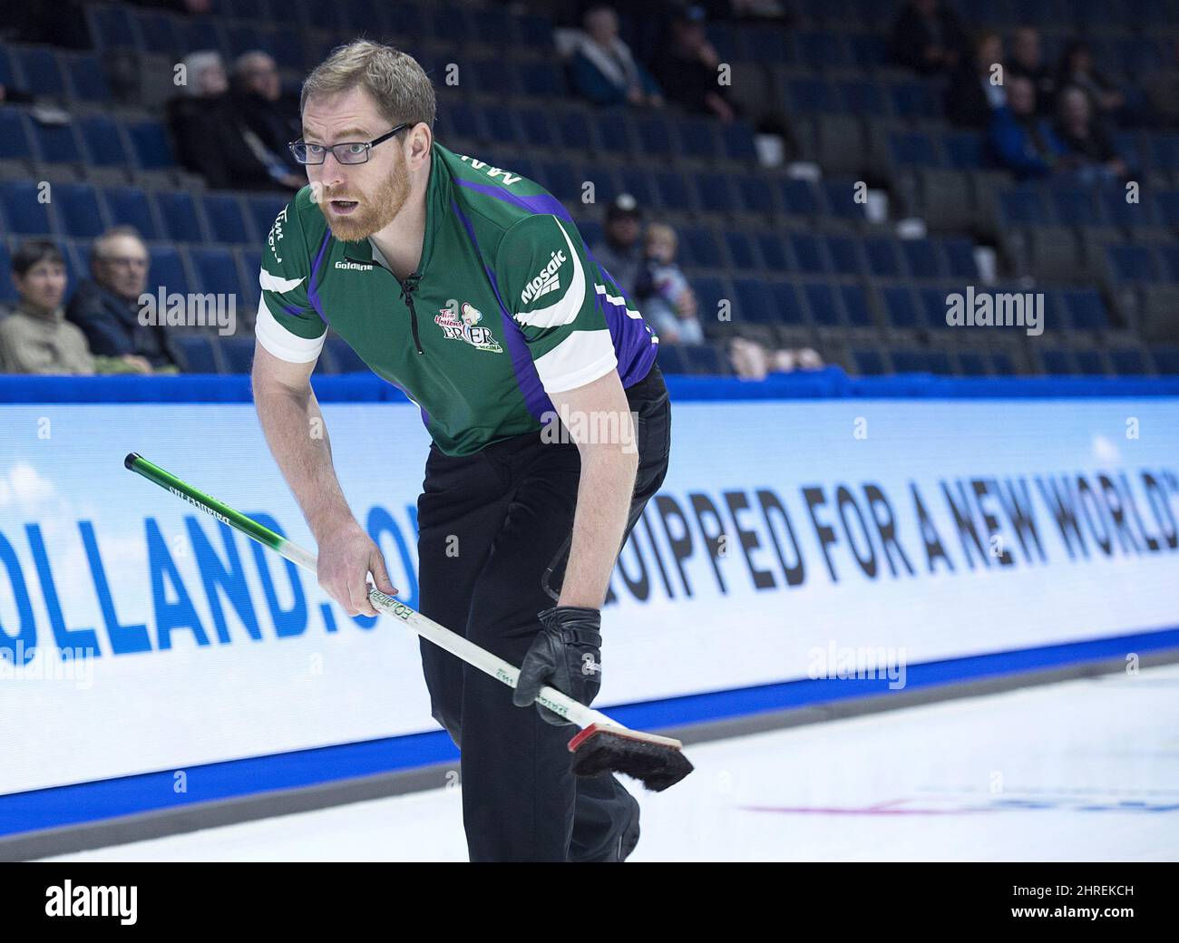 Prince Edward Island skip Eddie MacKenzie follows his rock as they play ...
