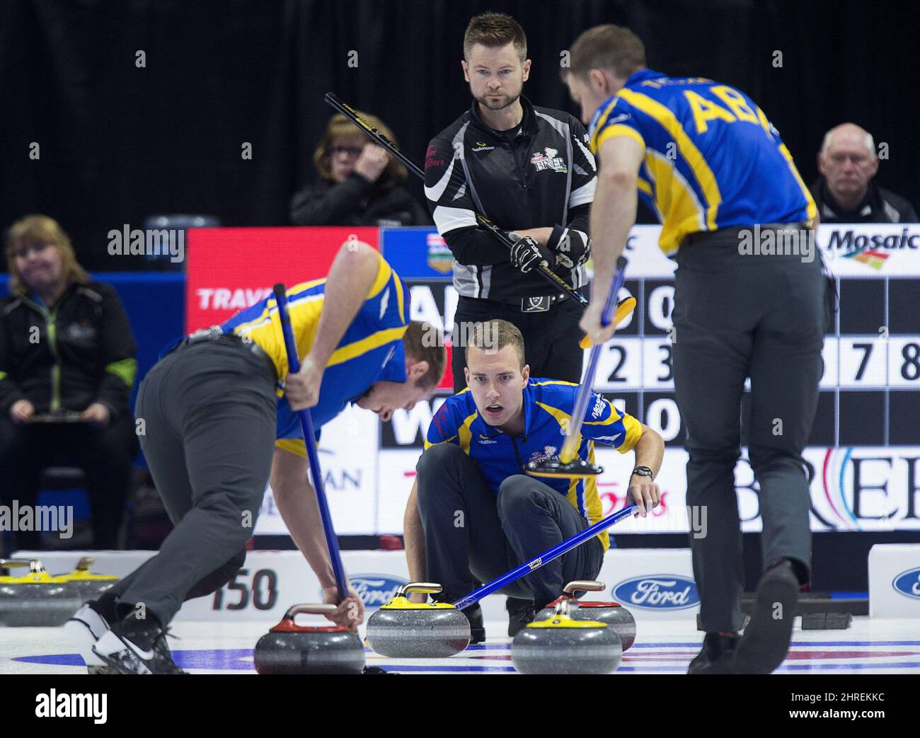 Mike McEwen, skip of the wild card team from Winnipeg, looks on as ...