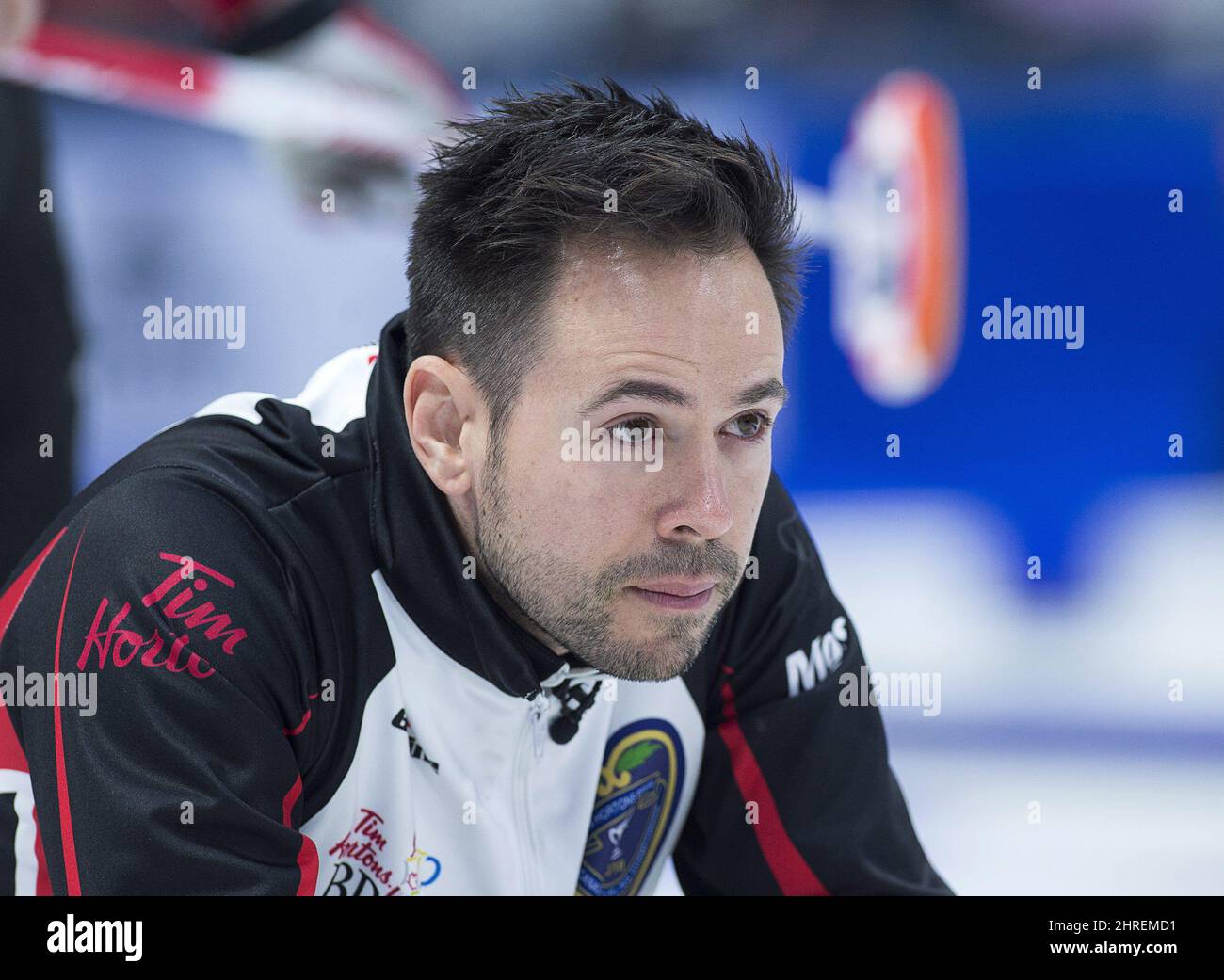Ontario skip John Epping watches a rock against Team Canada in the 1 vs ...
