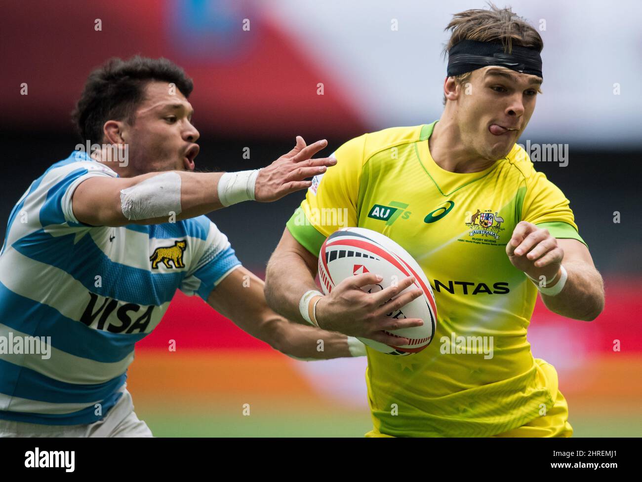 Argentina's Renzo Barbier, left, tries to tackle Australia's Charlie ...