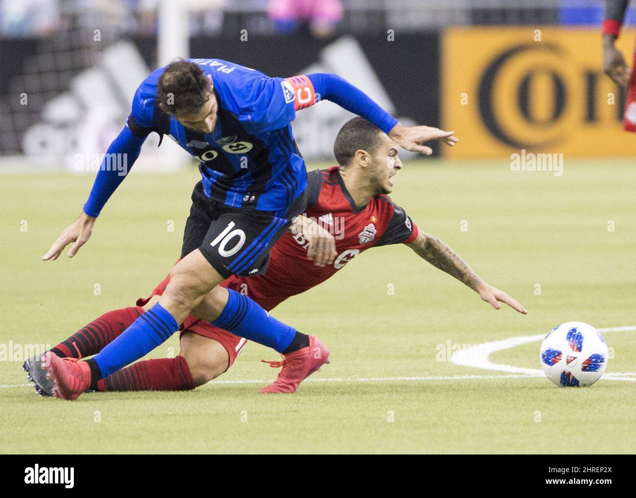 Montreal Impact midfielder Ignacio Piatti, left, battles for the ball ...