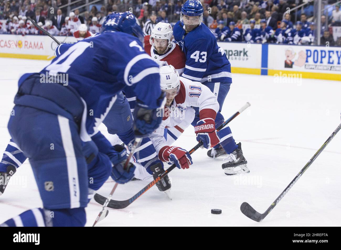 Montreal Canadiens Brendan Gallagher (centre) dives to gain possession ...
