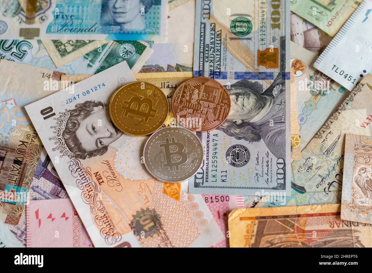 Digital coin crypto money on worldwide currencies banknotes Stock Photo ...