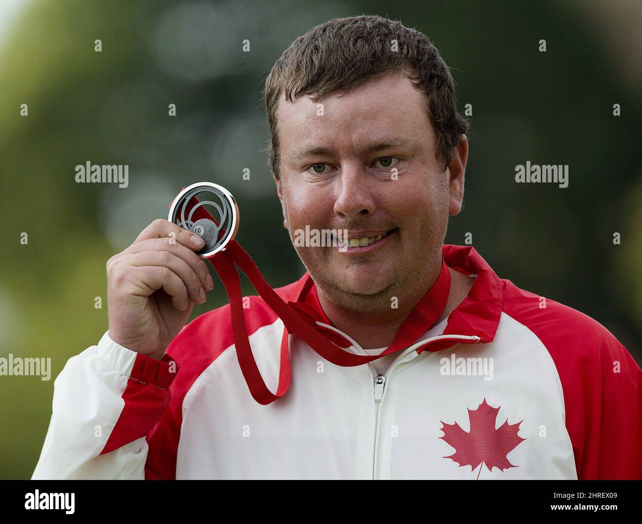 Canada's Ryan Bester displays his silver medal in lawn bowls at the ...