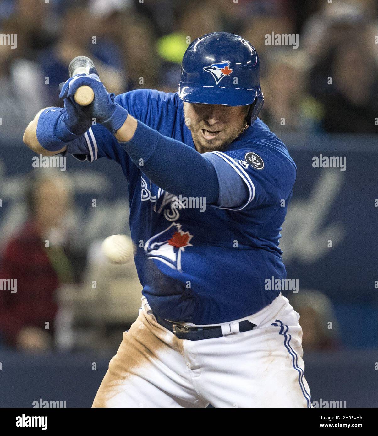 Toronto Blue Jays Justin Smoak is hit by a pitch in the sixth inning of ...