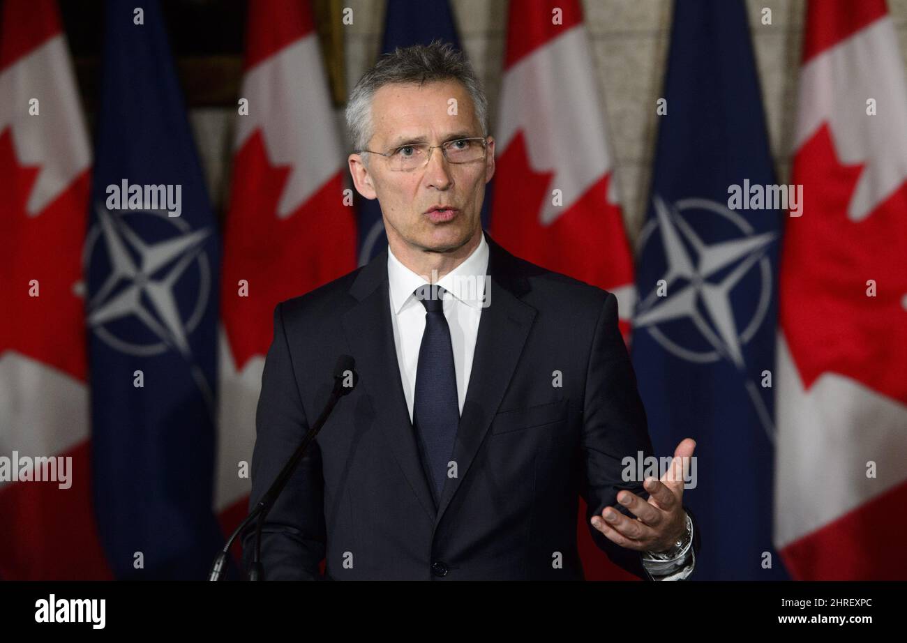 NATO Secretary General Jens Stoltenberg answers a question as he takes ...