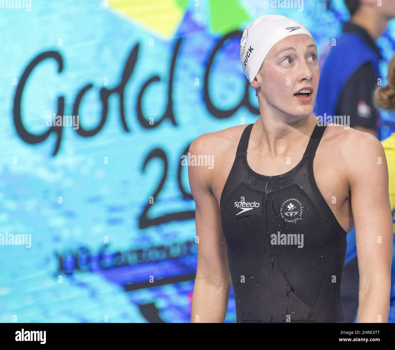 Canada's Taylor Ruck looks at the results after winning the gold medal ...