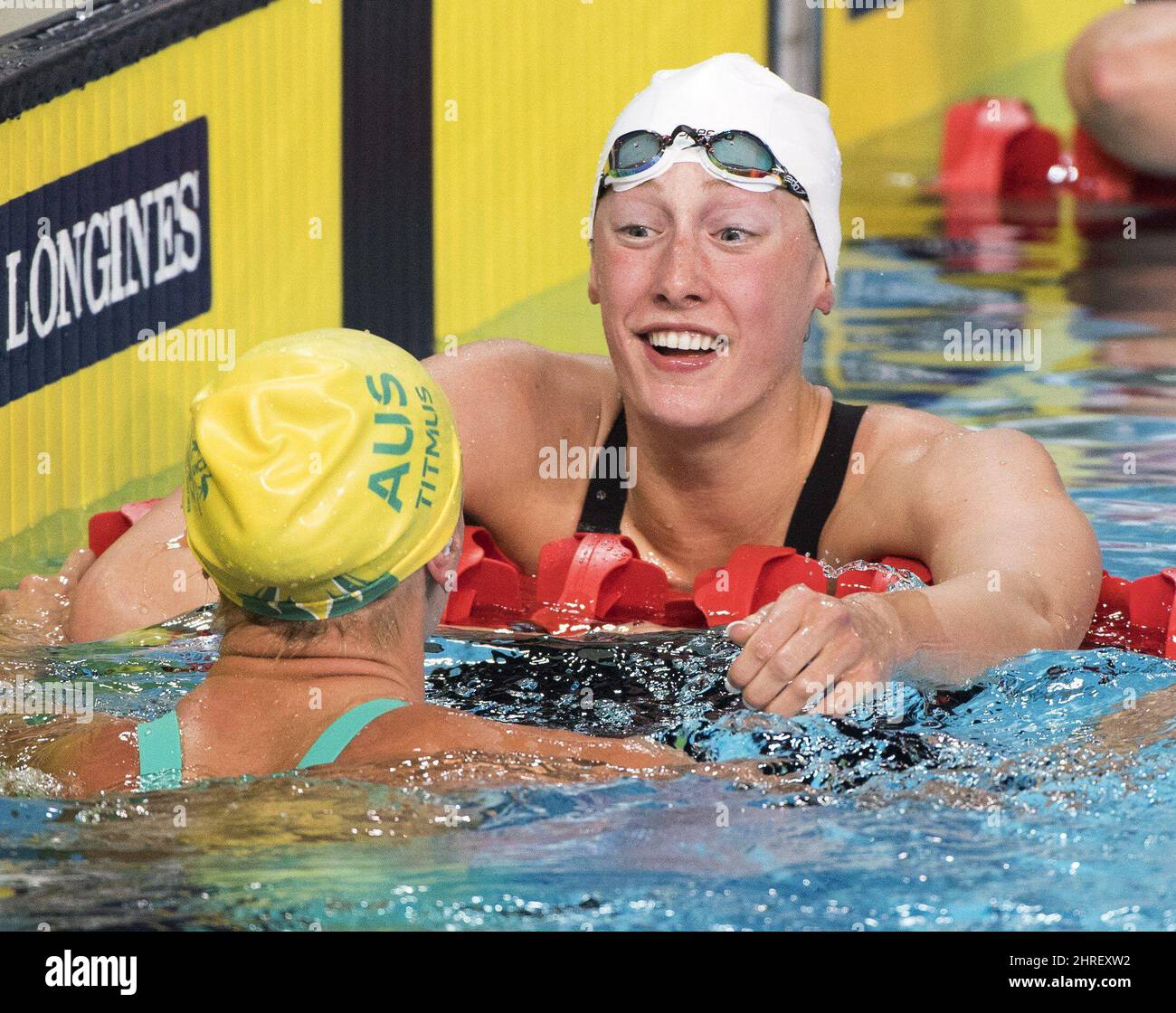 Canada's Taylor Ruck, right, is congratulated by Australia's Ariane ...
