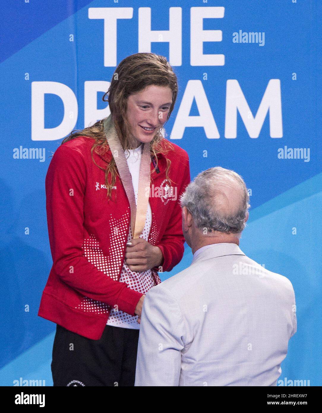 Canada's Taylor Ruck is presented with her gold medal in the women's ...