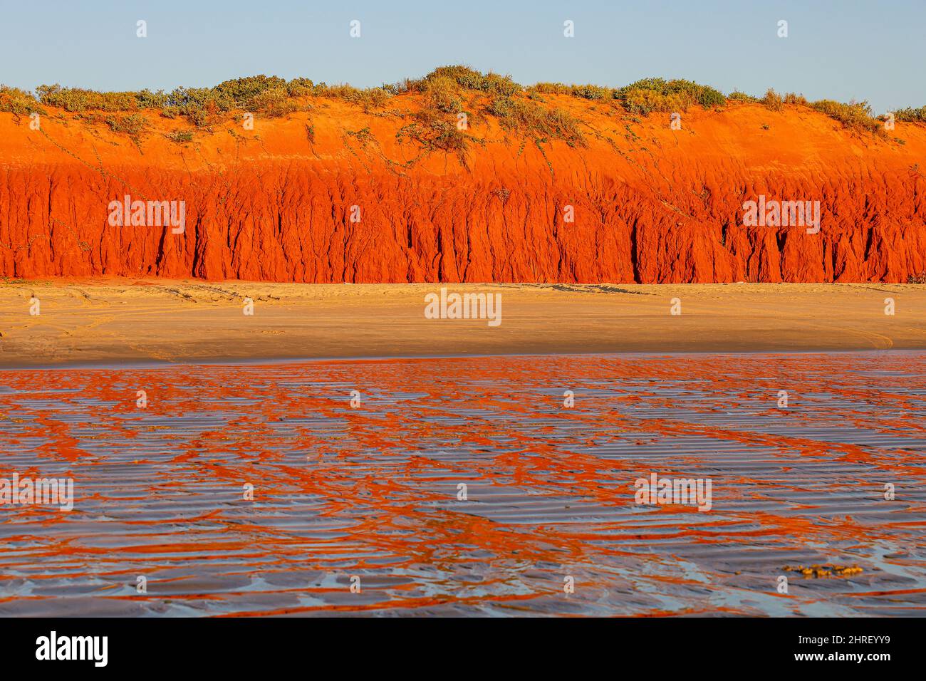 Beautiful shot of orange pindan cliffs at sunset in Barn Hill Station ...