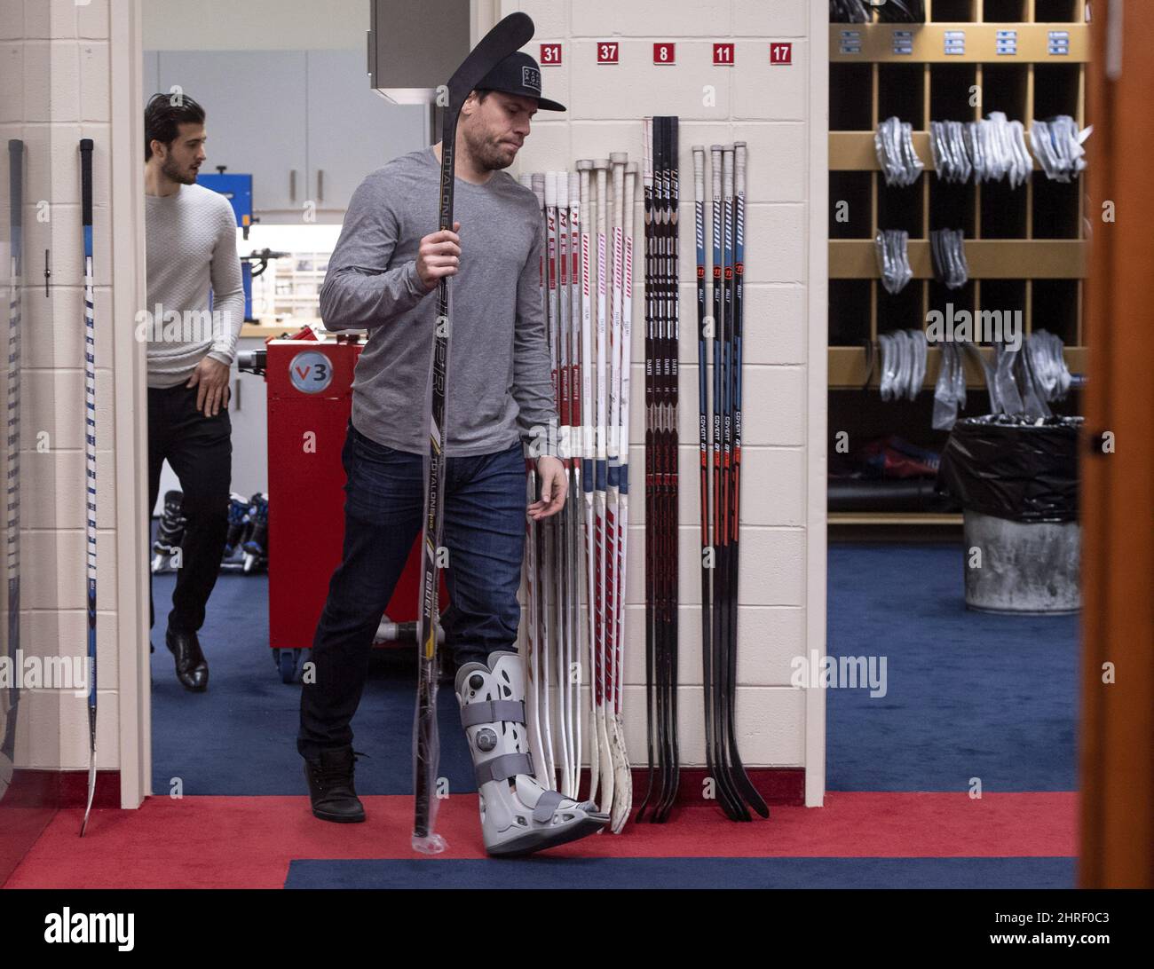 Montreal Canadiens' Shea Weber walks away with hockey sticks as the ...