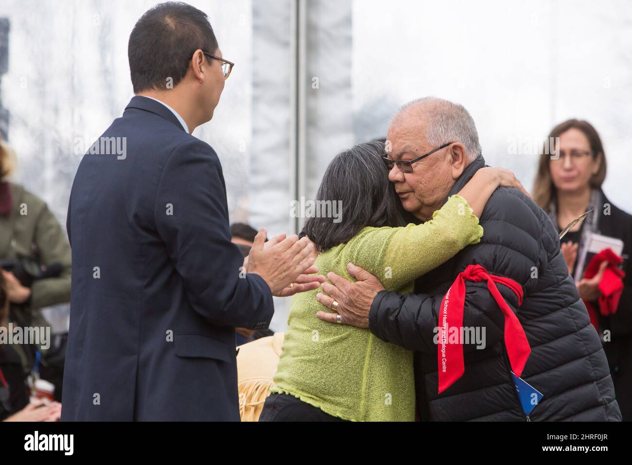 Barney Williams Jr., a residential school survivor, hugs Cindy Tom ...