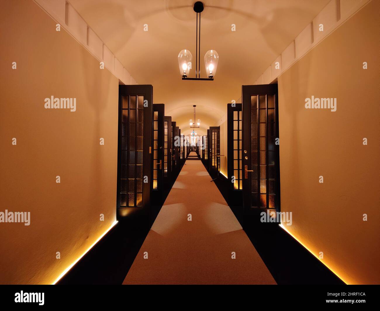 Long corridor doors hi-res stock photography and images - Alamy