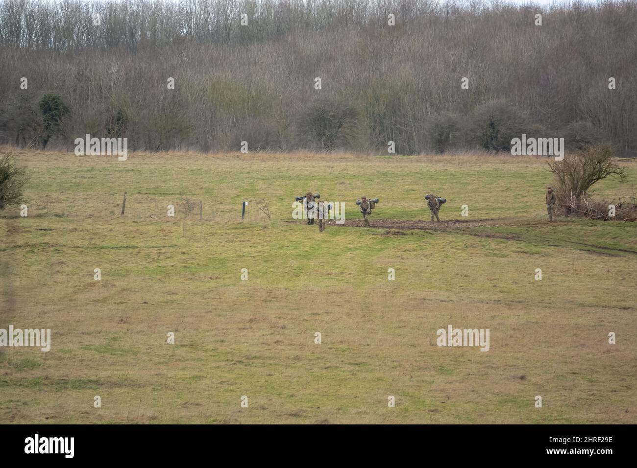 army soldiers on a military tabbing exercise with 40Kg bergen and anti ...