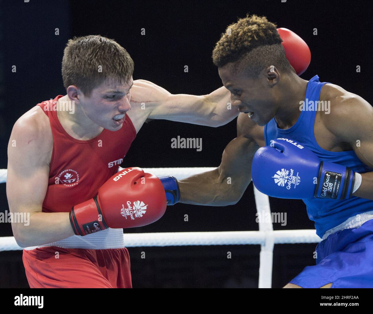 Canada's Thomas Blumenfeld , left, trades punches with Namibia's Jonas ...