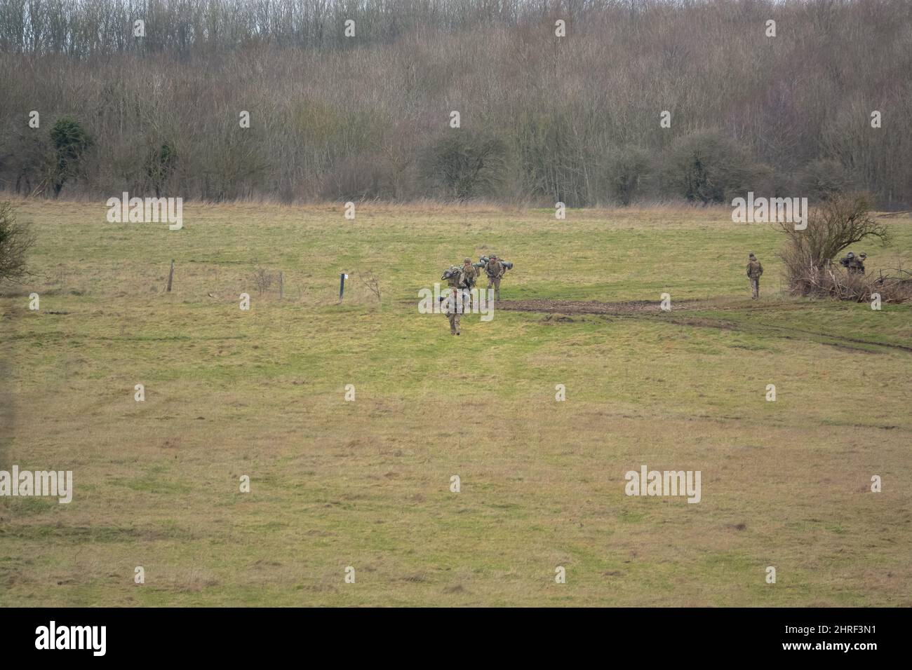 army soldiers on a military tabbing exercise with 40Kg bergen and anti ...