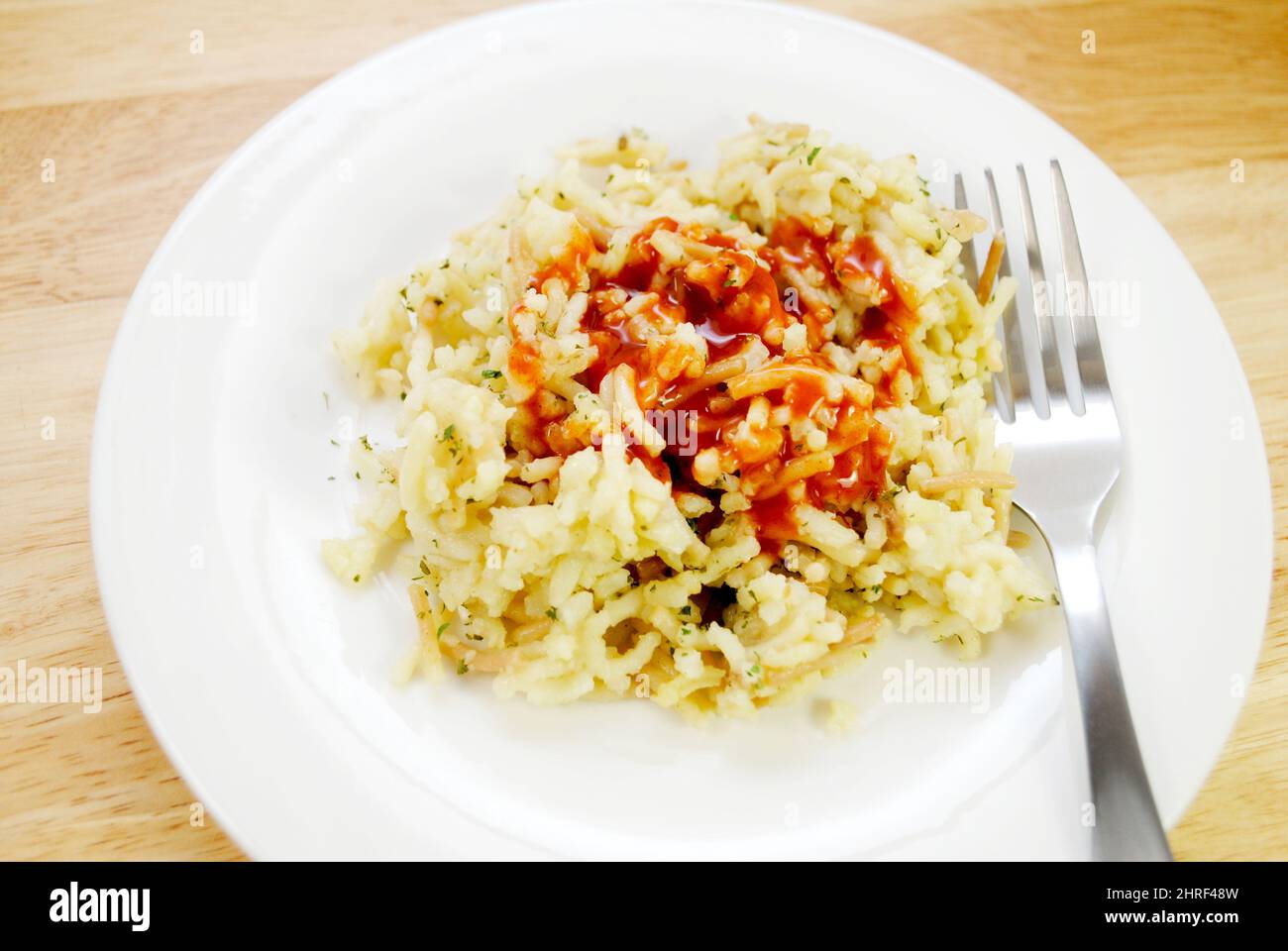 Steamed Wild Rice with Vermicelli Served with Hot Sauce Stock Photo - Alamy
