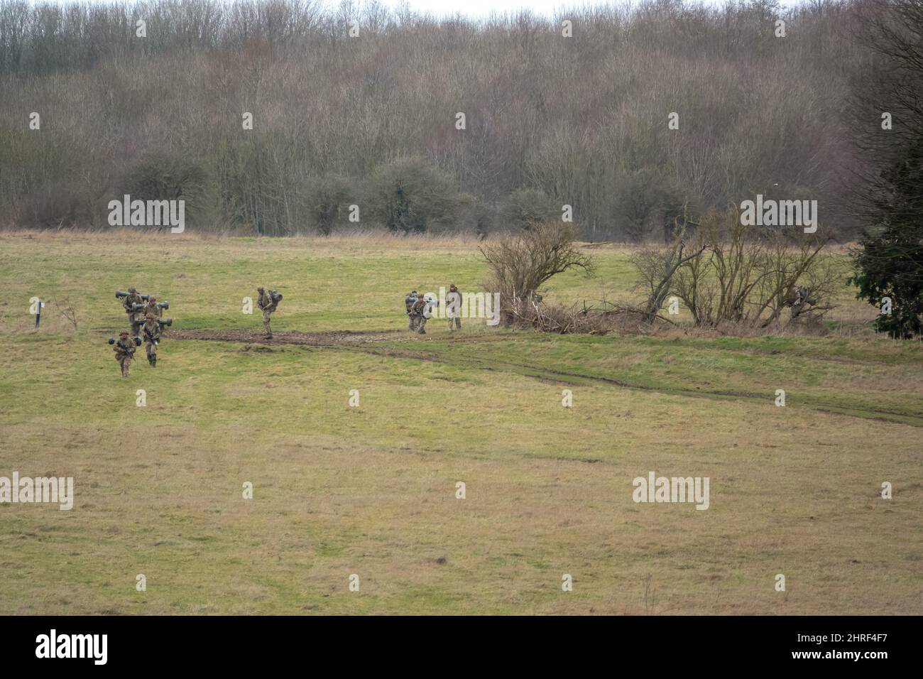 army soldiers on a military tabbing exercise with 40Kg bergen and anti ...
