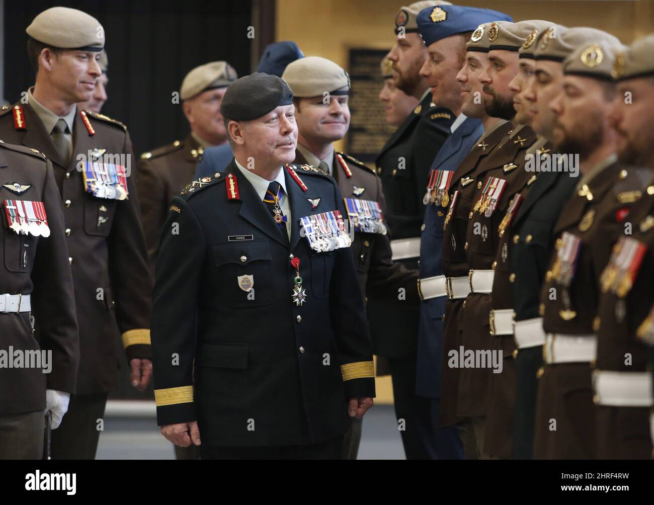 Chief of the Defence Staff General Jonathan Vance, center, outgoing ...