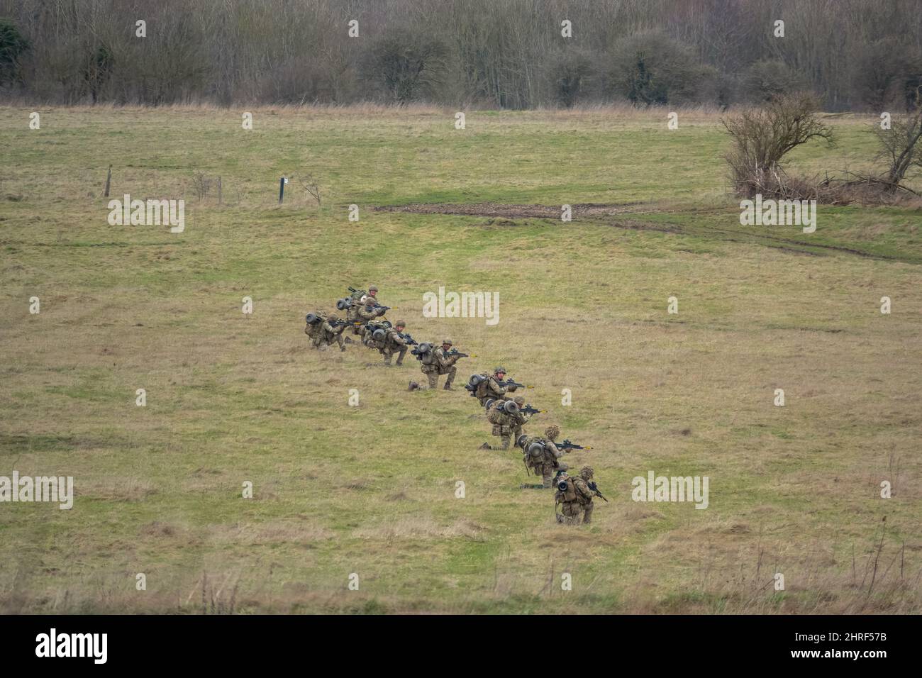 army soldiers on a military tabbing exercise with 40Kg bergen and anti ...