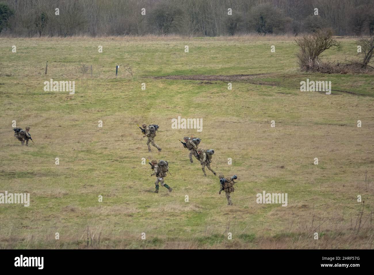 army soldiers on a military tabbing exercise with 40Kg bergen and anti ...