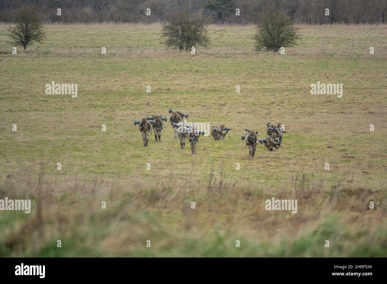 army soldiers on a military tabbing exercise with 40Kg bergen and anti ...