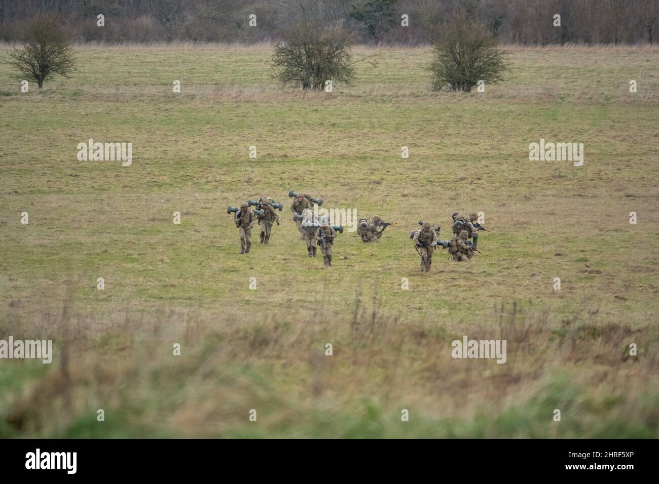 army soldiers on a military tabbing exercise with 40Kg bergen and anti ...