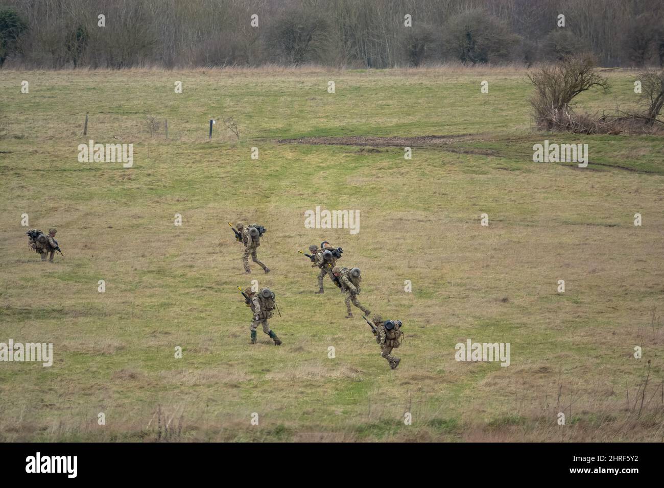 army soldiers on a military tabbing exercise with 40Kg bergen and anti ...