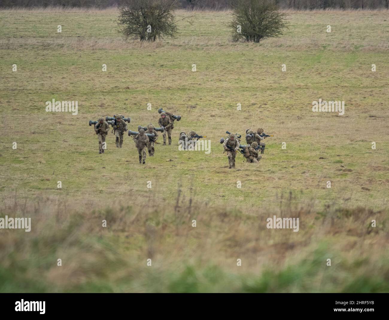 army soldiers on a military tabbing exercise with 40Kg bergen and anti ...