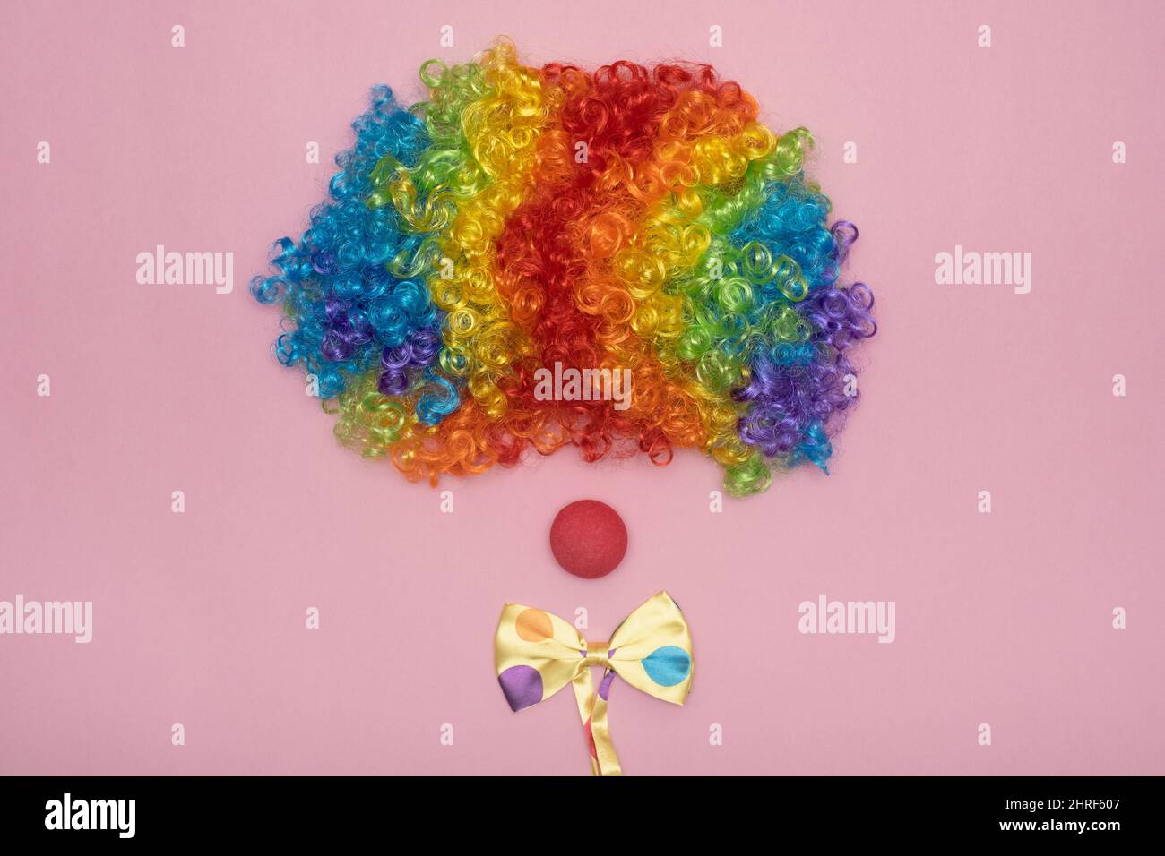 Funny Party concept clown face formed. Wig with Red clown nose like a ...
